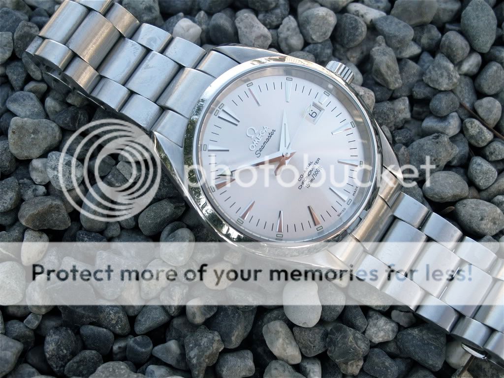 Silver hands on white/silver dials. Impossible to read, but somehow ...